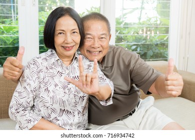Happy Asian Elderly Couple Love Sign Hand Photos and Images | Shutterstock