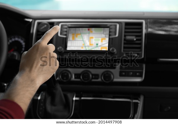 Man Using Navigation System While Driving Stock Photo 2014497908 ...