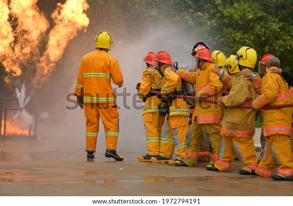 Practice Extinguishing Fire Firefighter Using Water Stock Photo ...