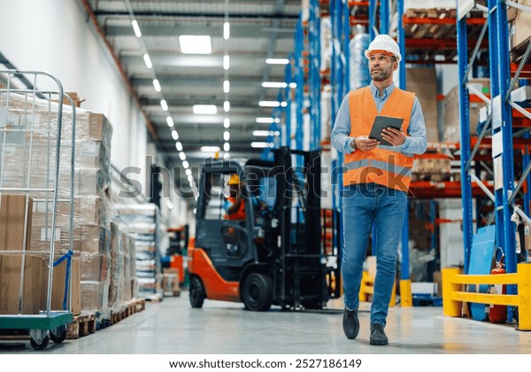 Warehouse Manager Using Digital Tablet Walking Stock Photo 2527186149 | Shutterstock