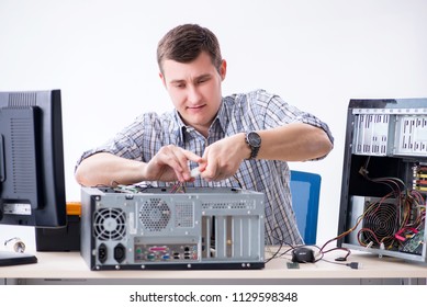 Technician Repairing Computer On White Background Stock Photo ...