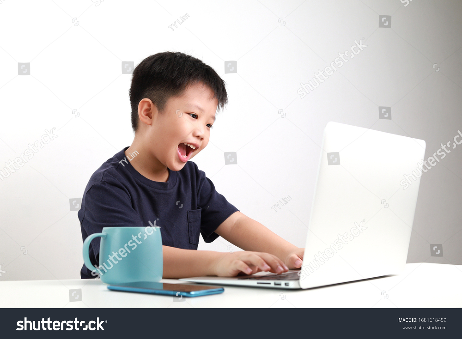 9,282 Asian Boy Laptop Sitting Images, Stock Photos & Vectors ...