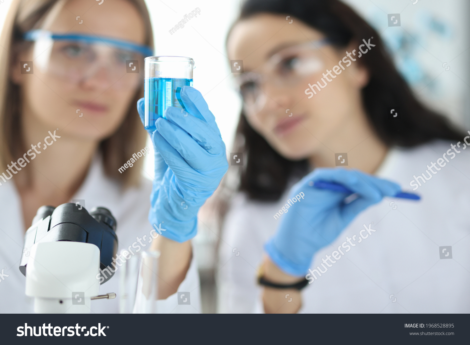 Two Scientists Conducting Experiments Laboratory Stock Photo 1968528895 | Shutterstock