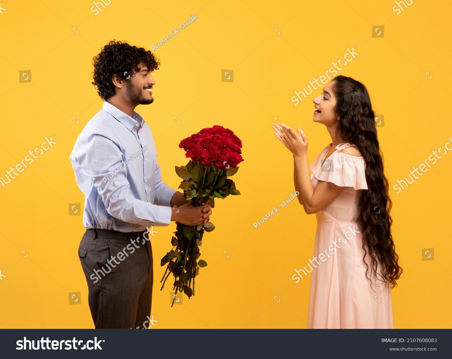 A Man Giving Roses To A Girl
