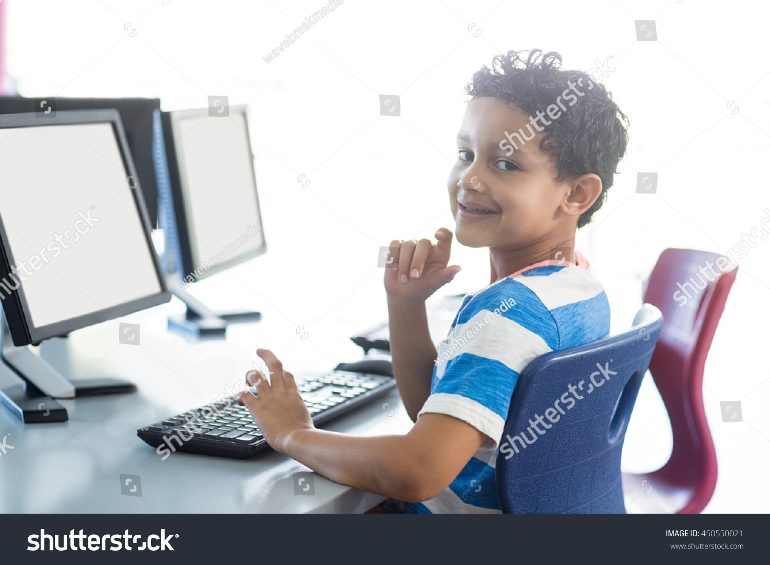 Portrait Smiling Boy Using Computer Classroom Stock Photo 450550021 ...